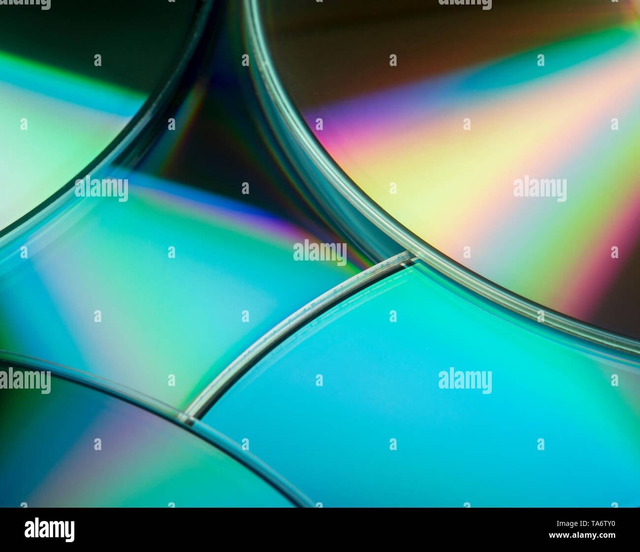 Colorful background with shiny compact discs Stock Photo - Alamy