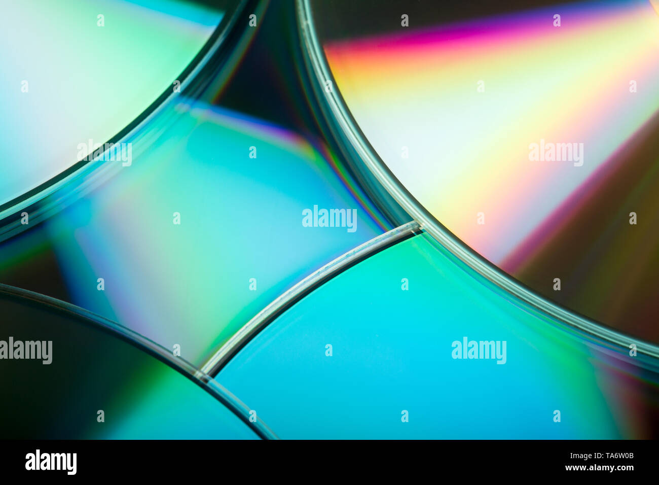 Colorful background with shiny compact discs Stock Photo - Alamy