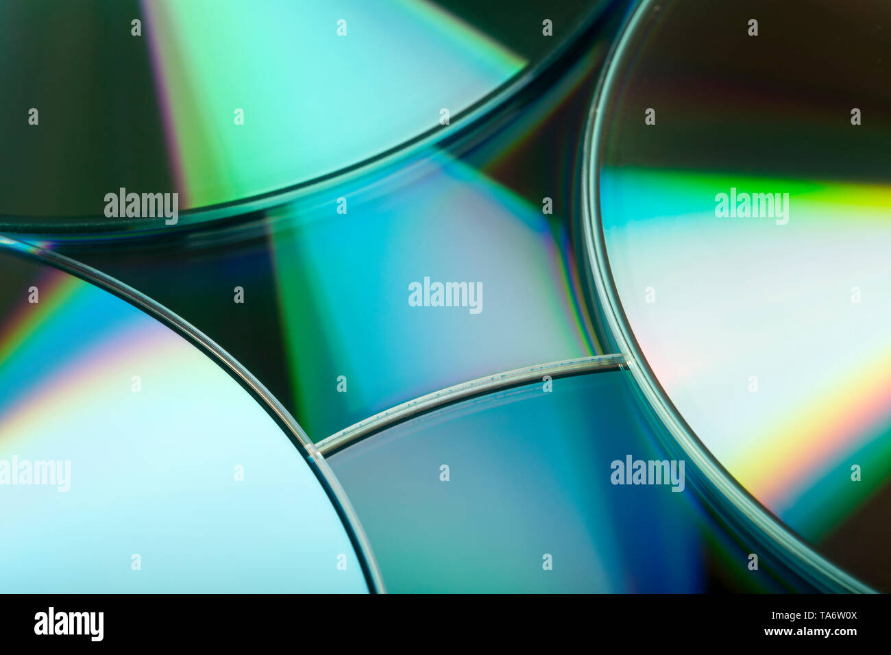 Colorful background with shiny compact discs Stock Photo - Alamy