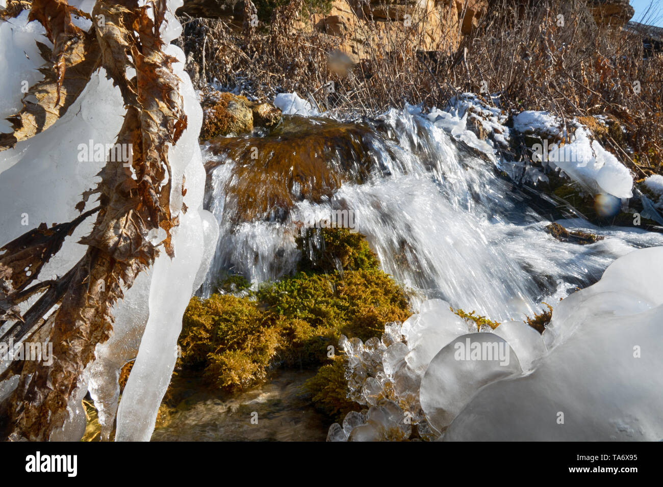 Mountain river on frosty day and icing stones. Becomes clear mechanism ...