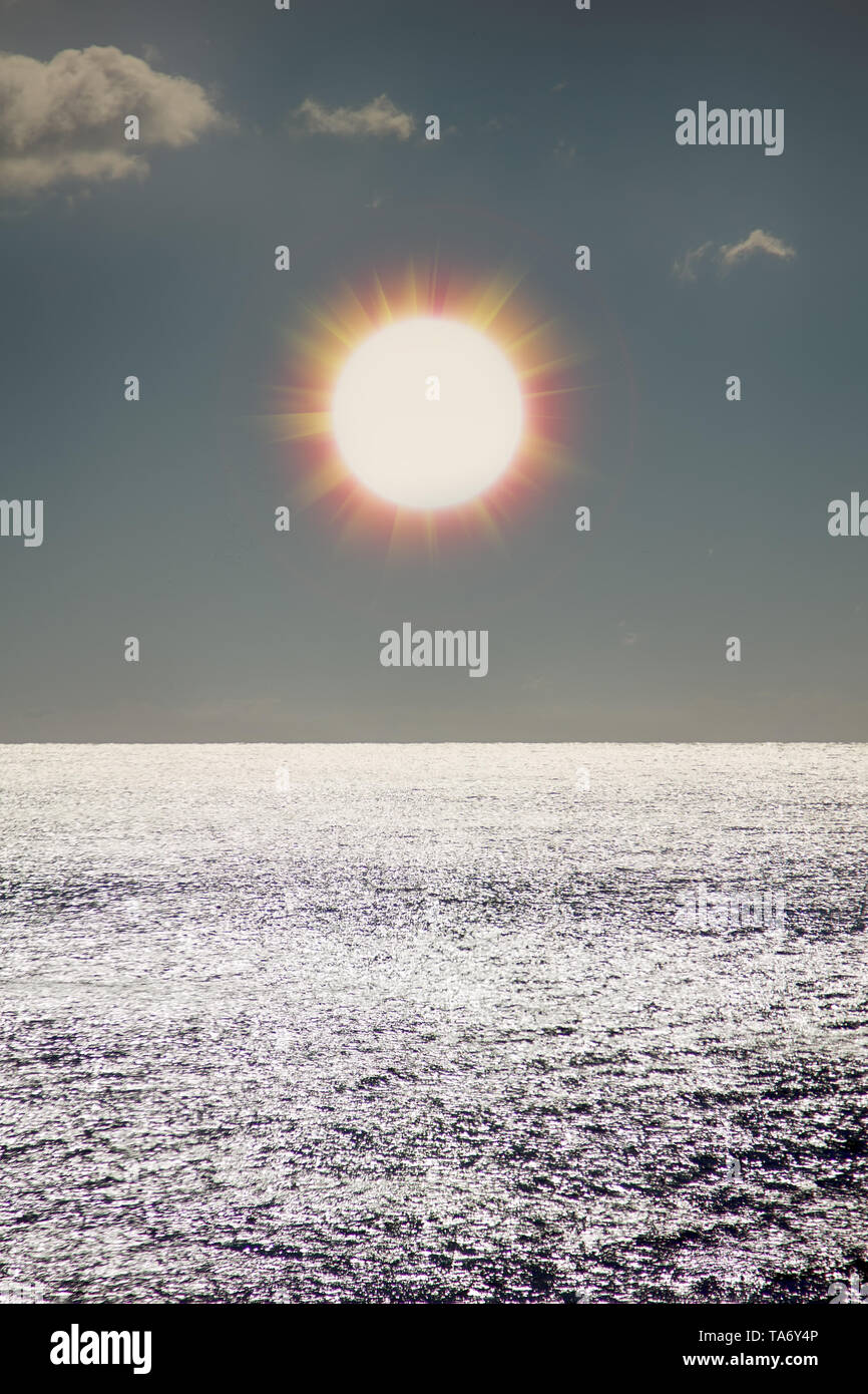 Low autumn sun and sun glade (path) on the sea surface Stock Photo - Alamy