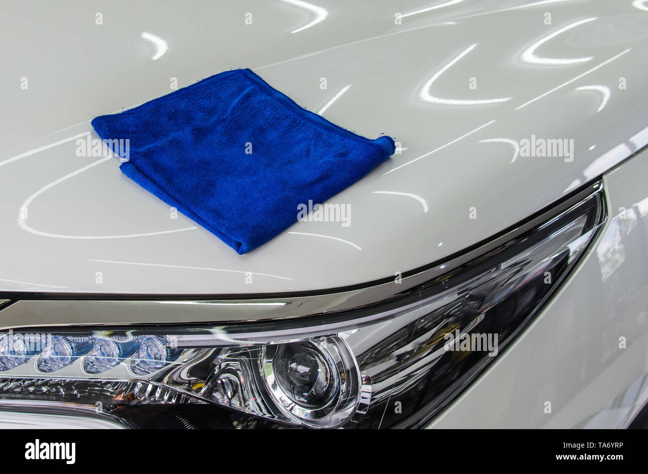Blue microfiber cloth on the car Stock Photo - Alamy