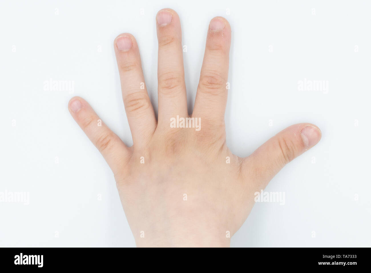 This is a capture for a child hand on a white background in a studio ...