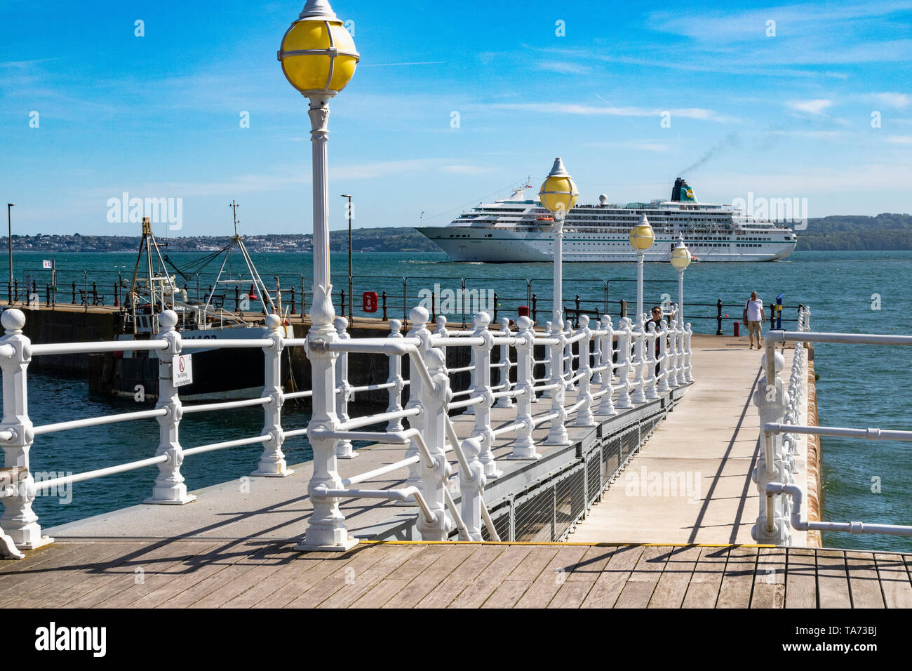 View of Torquay Inner Harbour Walkway With Moored Cruise Ship in Torbay ...