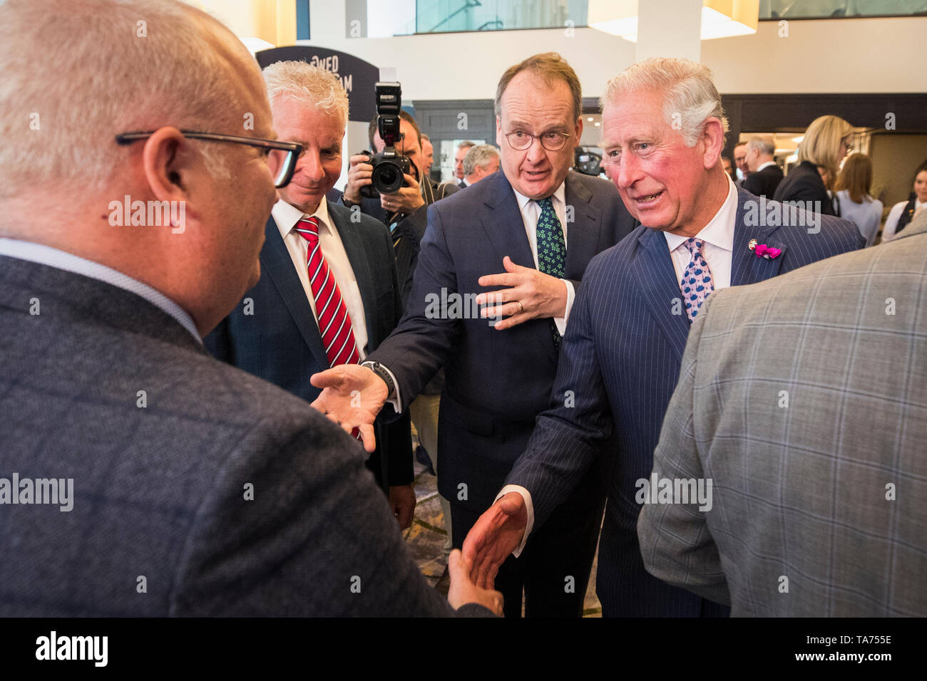 The Prince of Wales is introduced to Belfast fishmonger Crawford Erwing ...