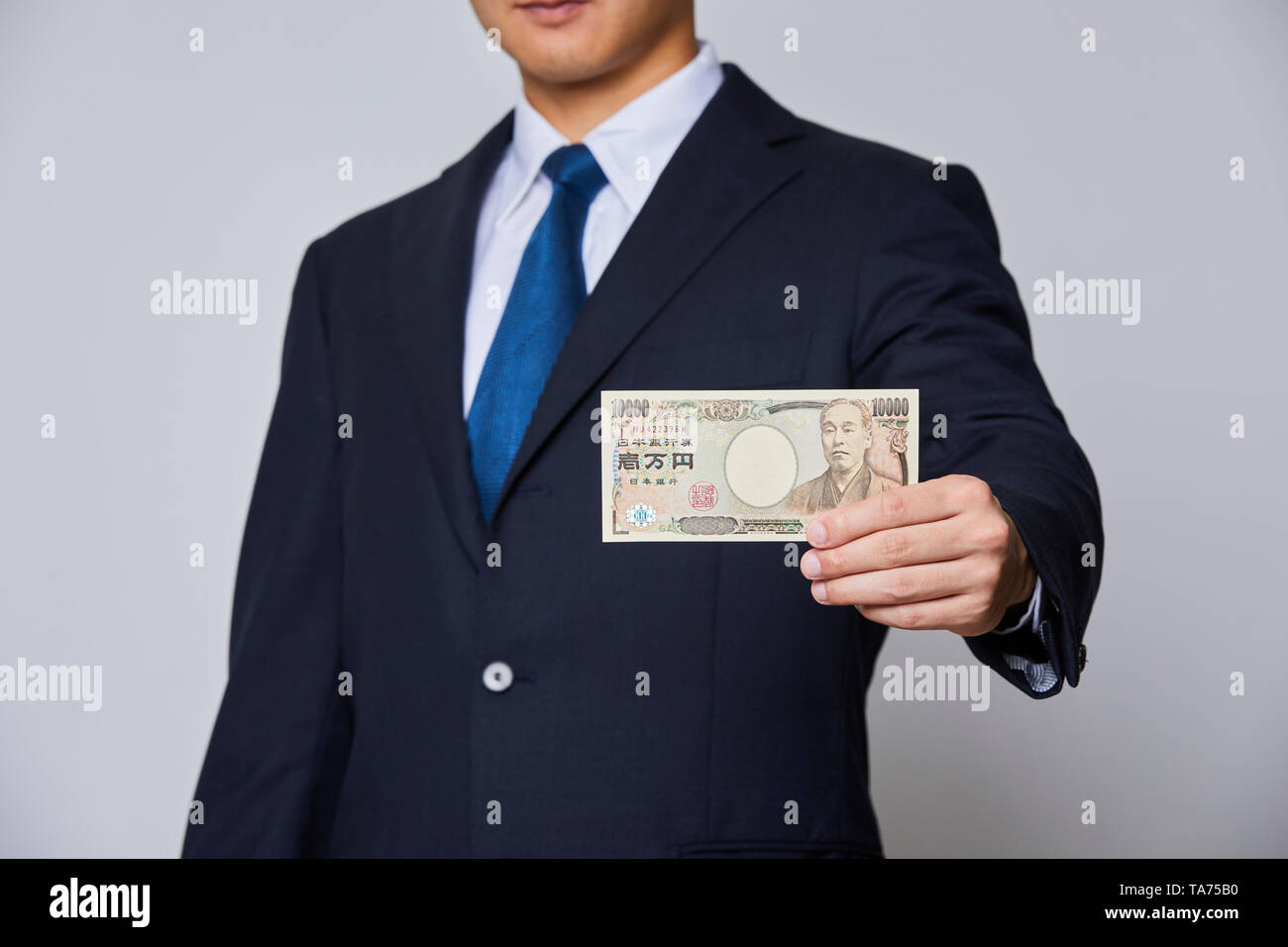Ten thousand japanese yen bills hi-res stock photography and images - Alamy