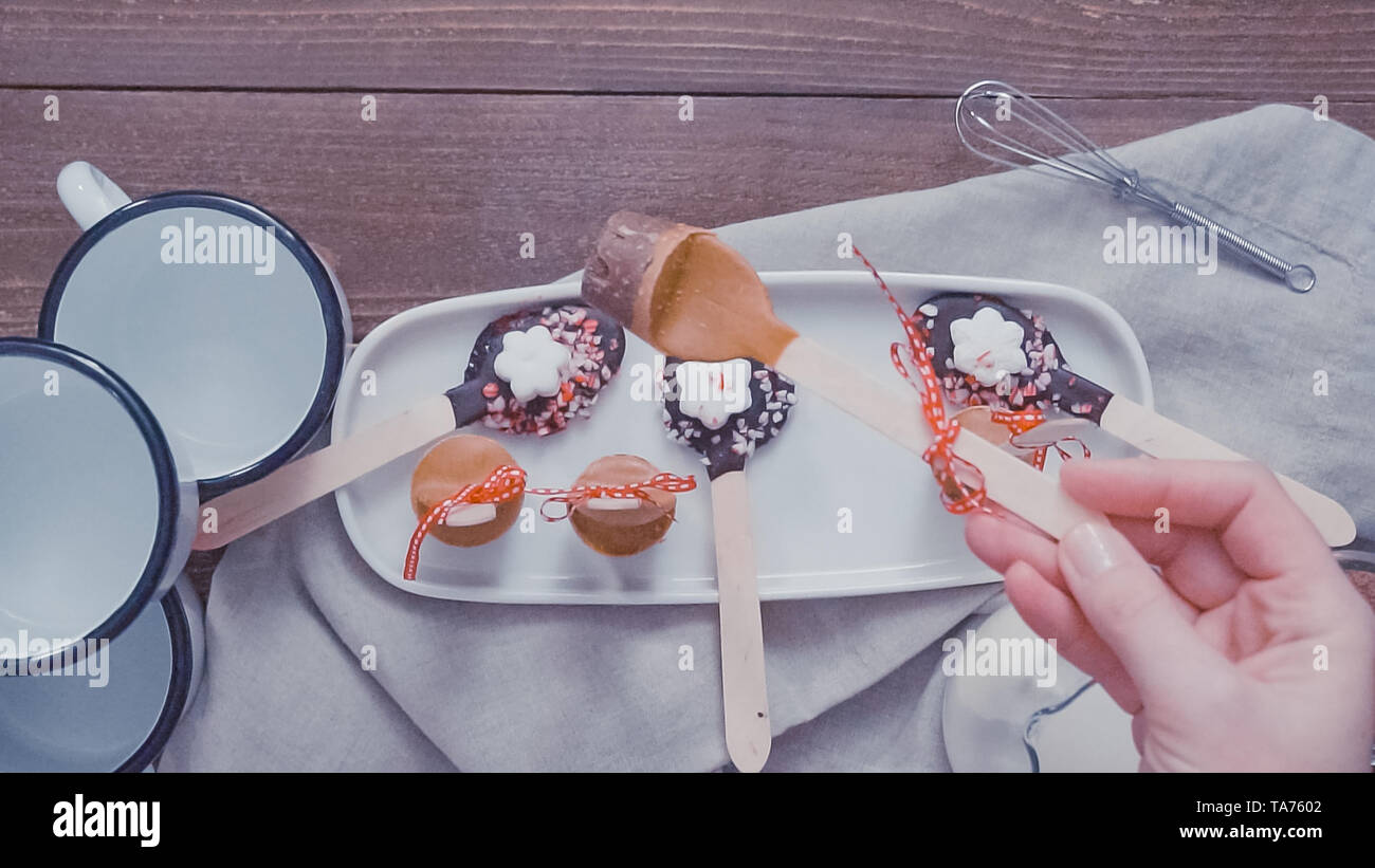 Flat lay. Salted caramel hot cocoa spoons on a white tray Stock Photo ...