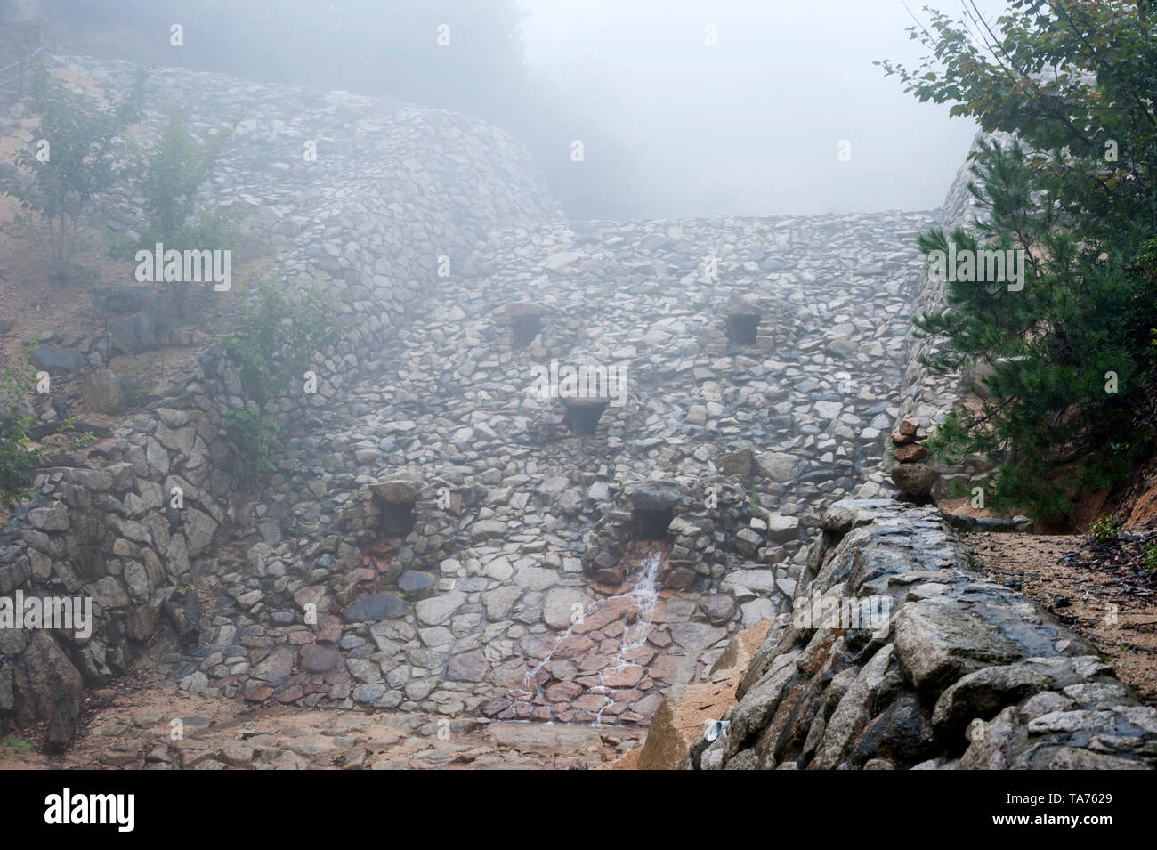 Drainage pipes as flood protection on the ascent of Mount Misen ...