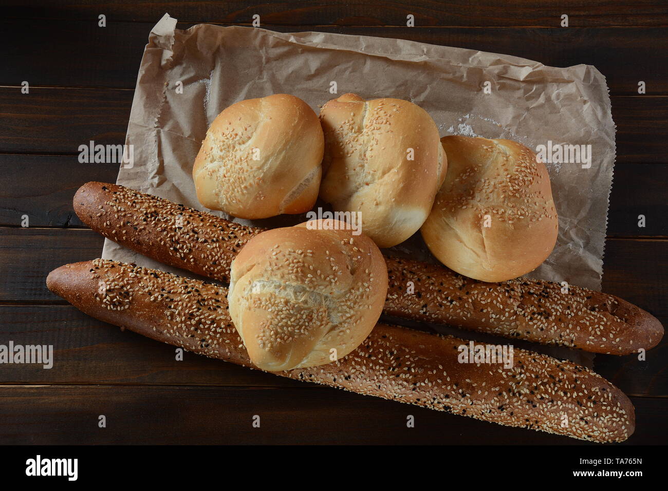 Bakery. Fresh fragrant baked bread. Homemade bread on wooden background ...