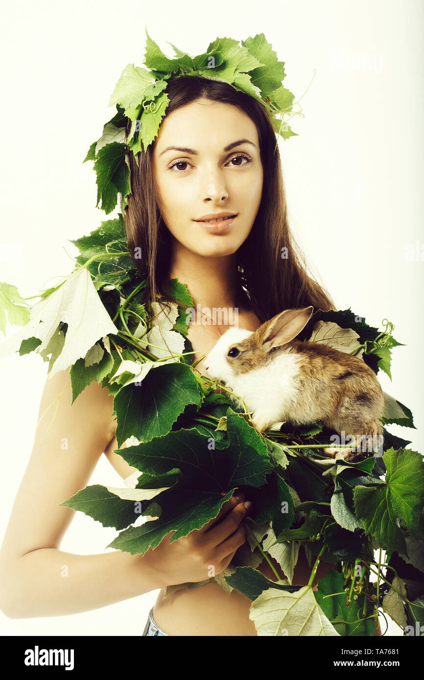 Beautiful woman with rabbit Stock Photo - Alamy