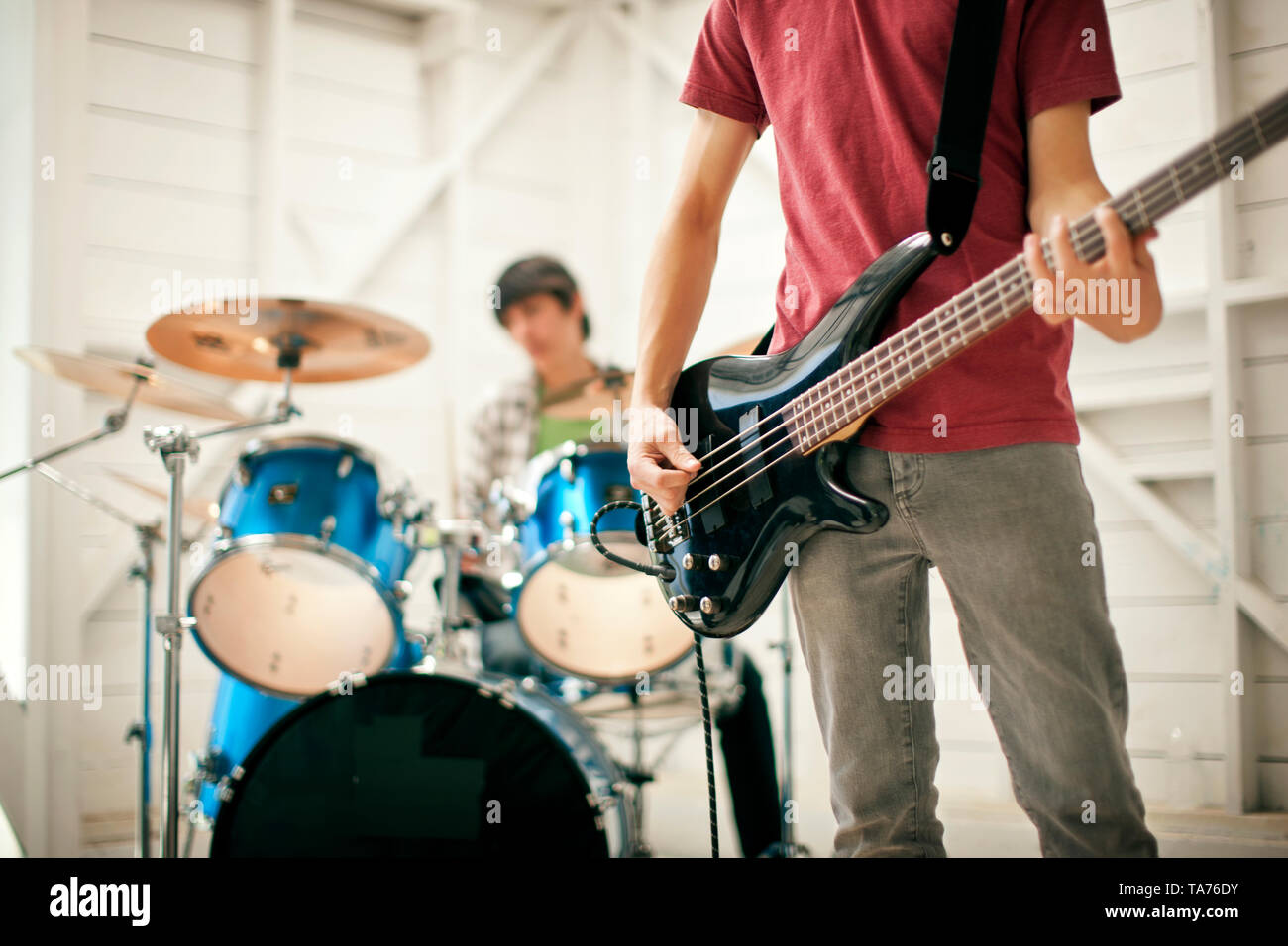 Friends playing musical instruments together Stock Photo - Alamy