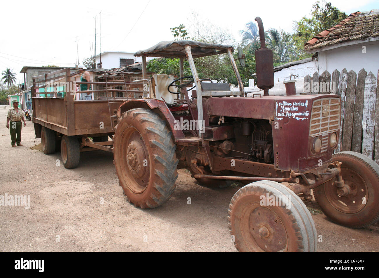 Trinidad, Cuba - March 30, 2006: Old tractor collecting garbage in ...