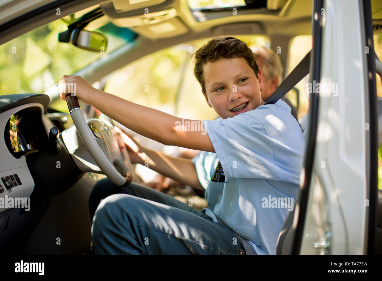 Driving lessons boy hi-res stock photography and images - Alamy