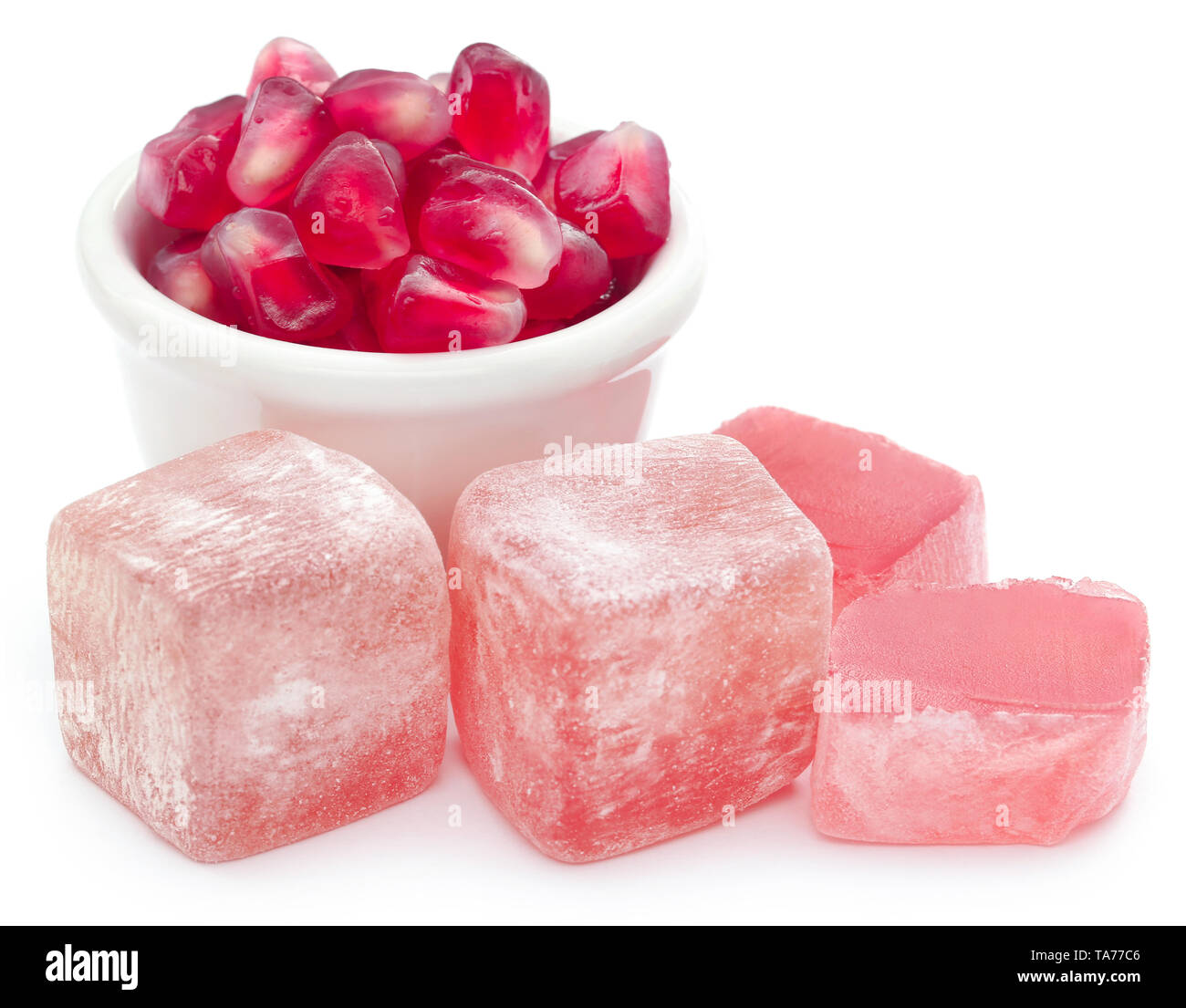 Popular Turkish delight of pomegranate flavor over white background ...