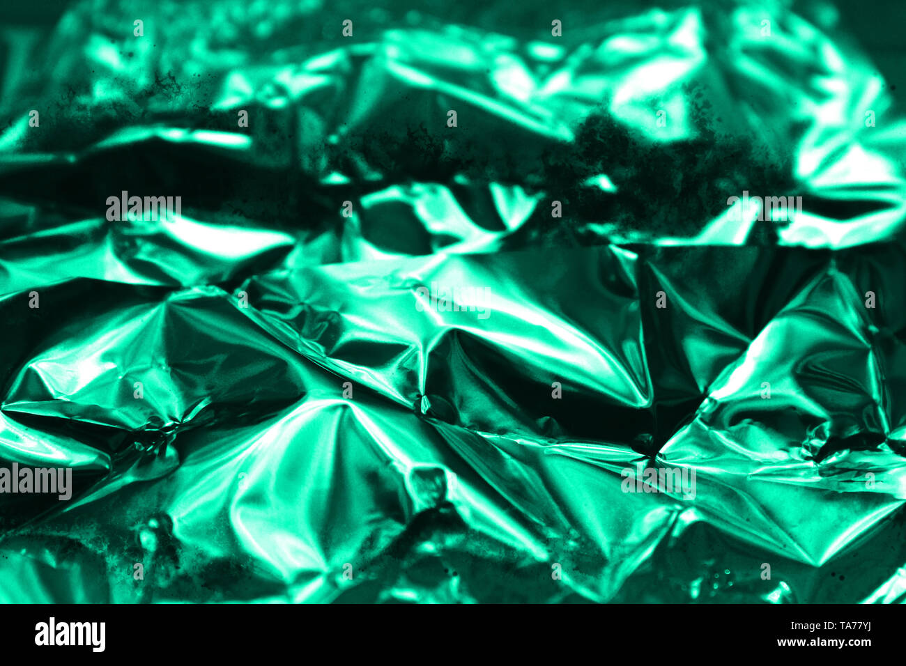 Holographic iridescent foil texture background. It can be used for ...