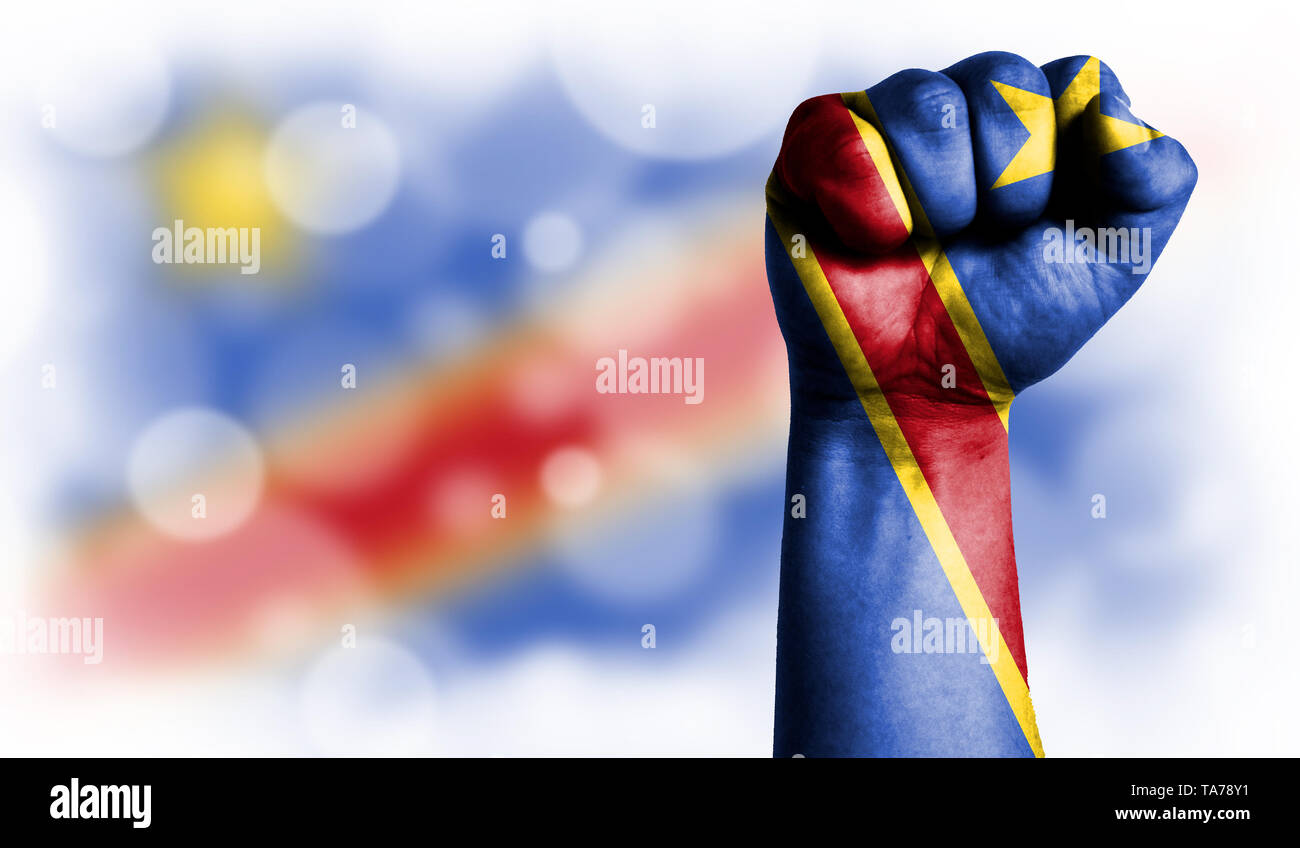 Flag of Congo Democratic painted on male fist, strength,power,concept ...