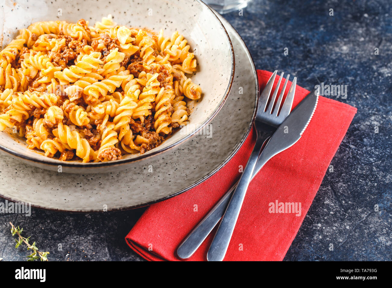 Pasta fusilli with bolognese tomato beef sauce. Traditional italian ...