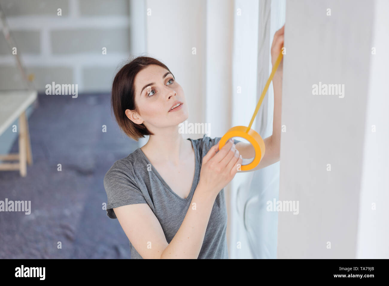 Taping wall hi-res stock photography and images - Alamy
