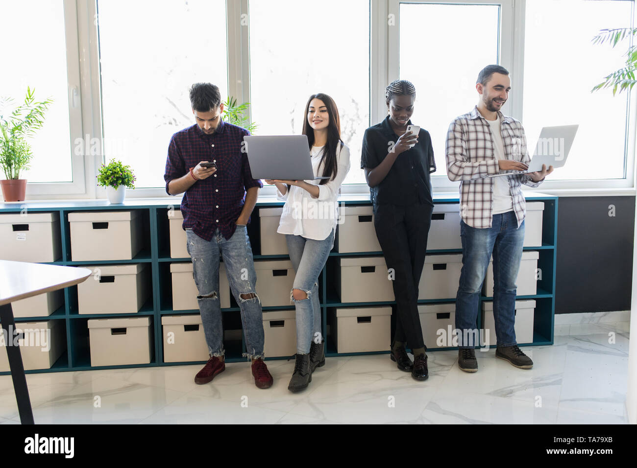 Businesspeople using digital devices hi-res stock photography and ...