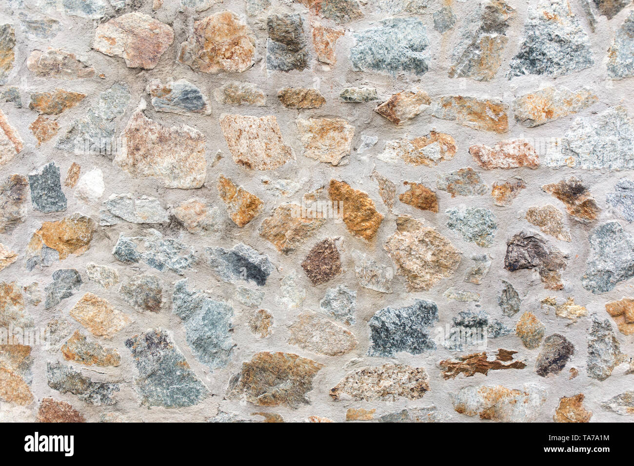 Old rough stone wall. Rock gray background Stock Photo - Alamy