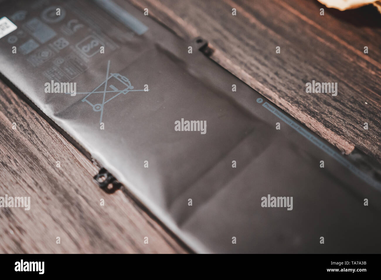 Close of of warning label of Swollen Lithium Polymer (Li-Po) laptop ...