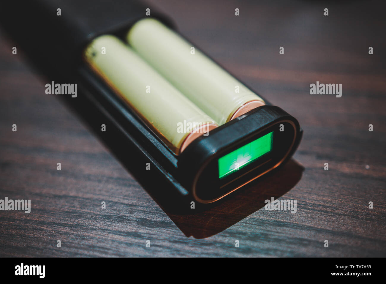 Green 18650 Lithium Ion Battery Cell inside an interchangeable power ...