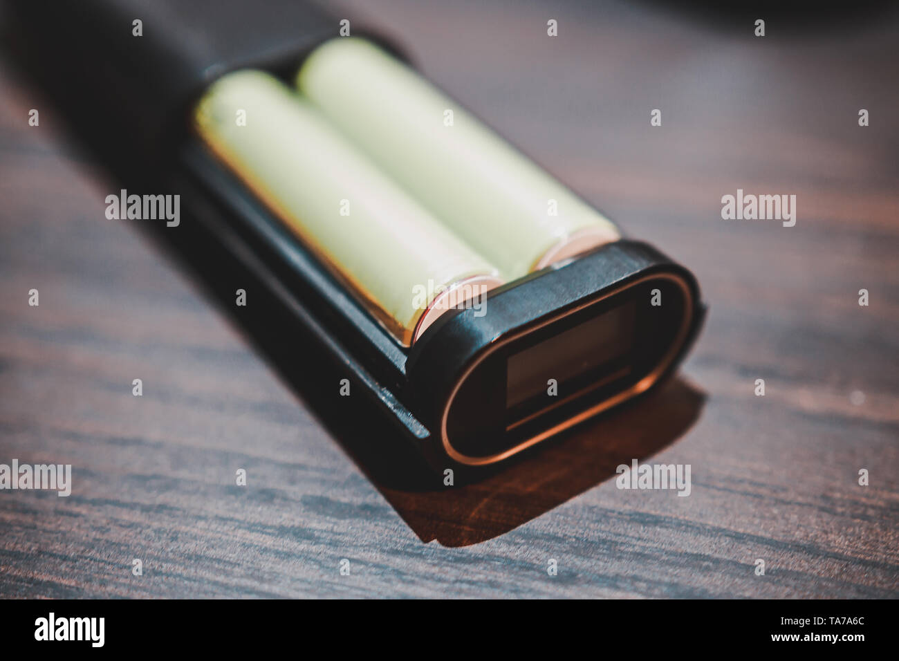 Green 18650 Lithium Ion Battery Cell inside an interchangeable power ...