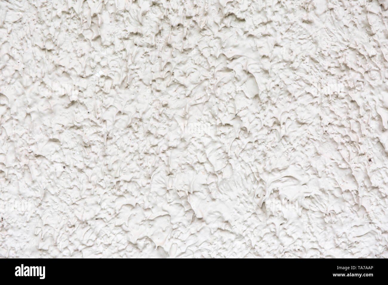 Plaster wall background. Grainy white rough texture Stock Photo - Alamy