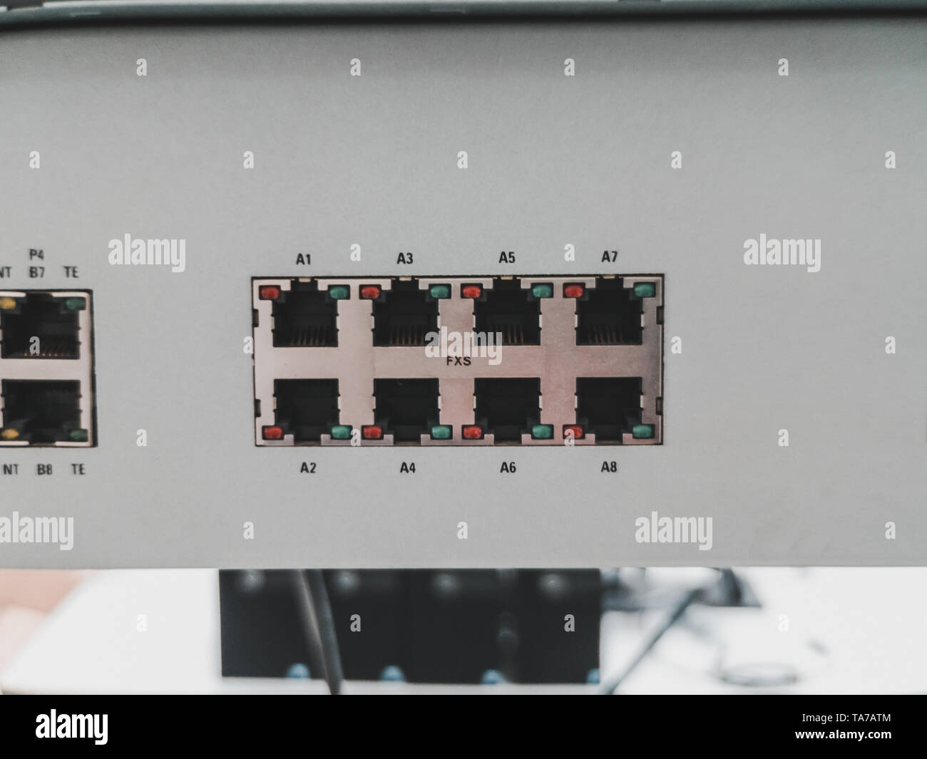 Lots of RJ45 Ethernet cable port in front of a rack switch in a server ...