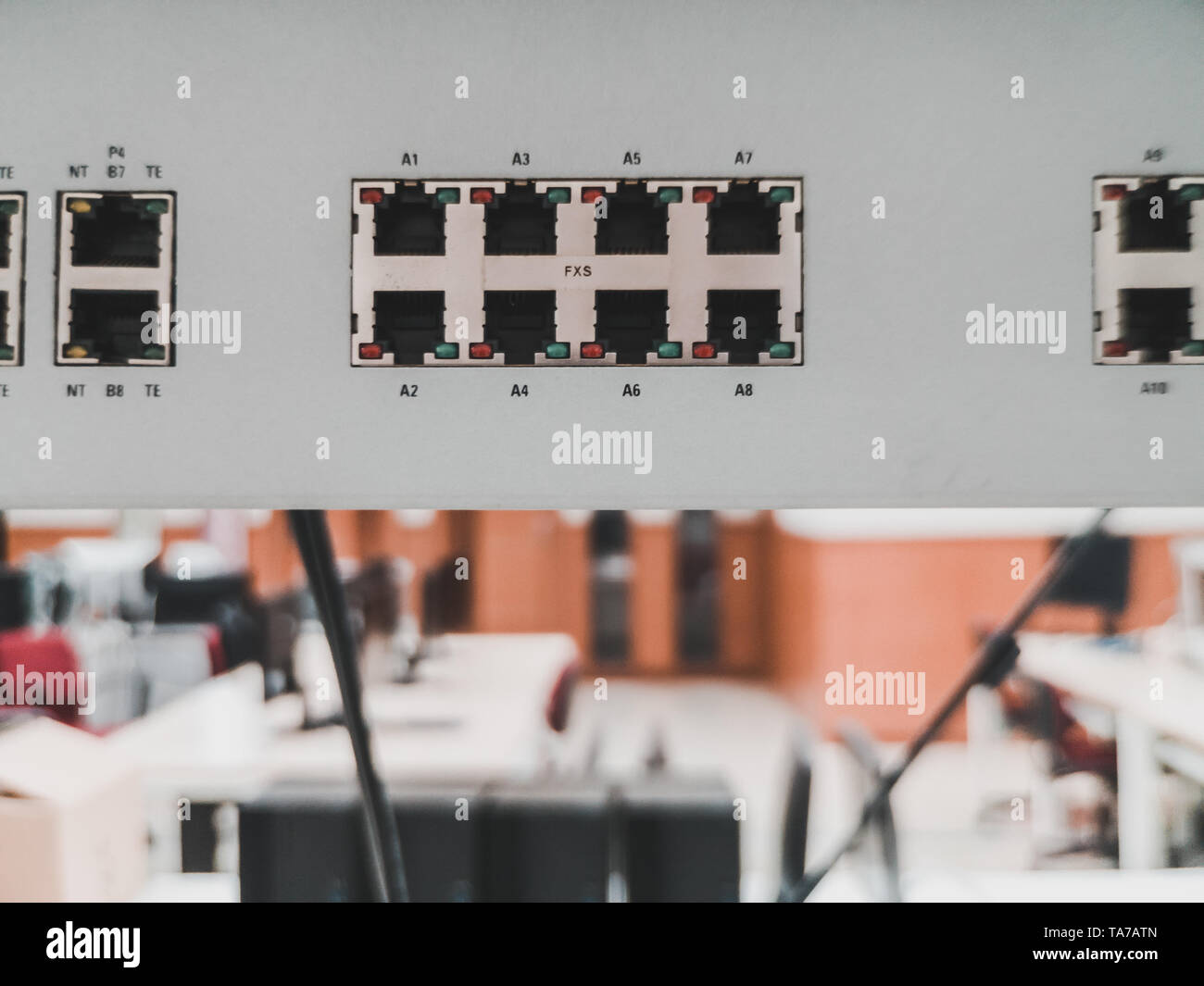 Lots of RJ45 Ethernet cable port in front of a rack switch in a server ...