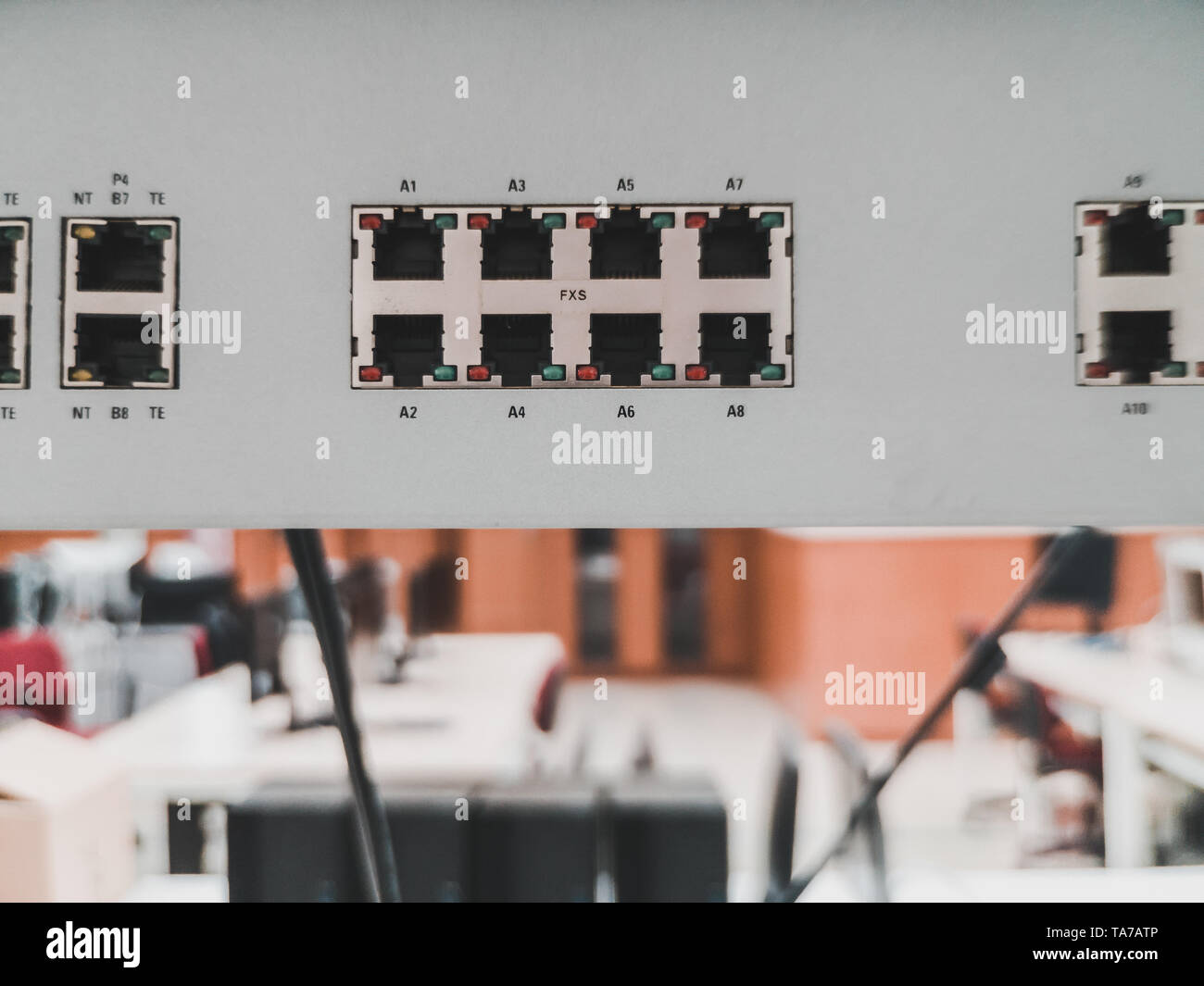 Lots of RJ45 Ethernet cable port in front of a rack switch in a server ...