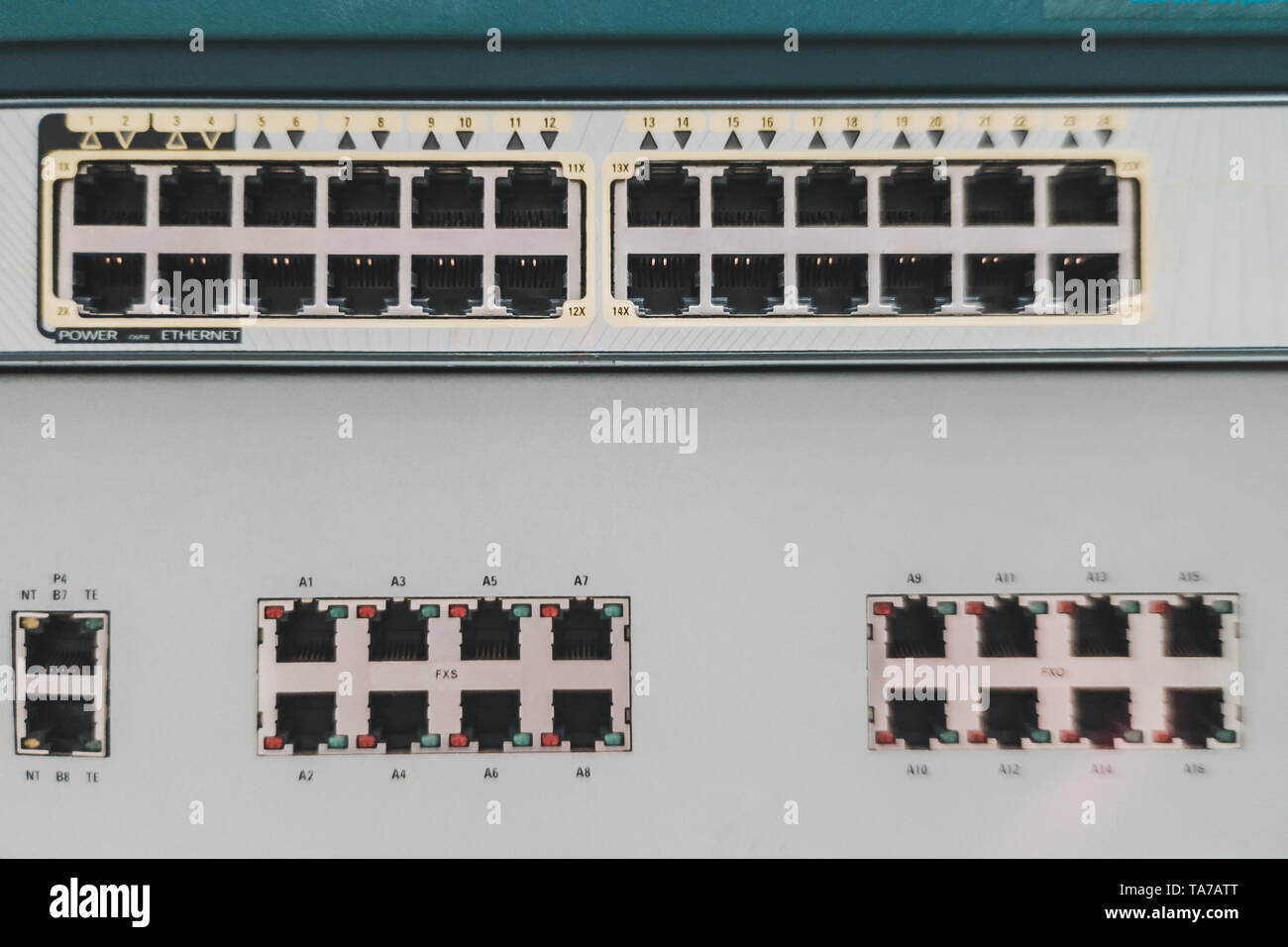 Lots of RJ45 Ethernet cable port in front of a rack switch in a server ...