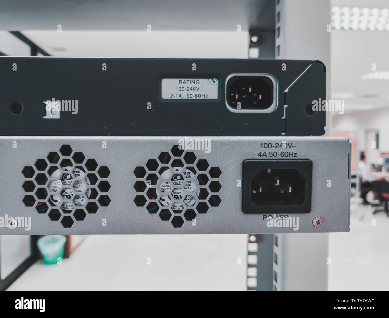 Close up of the ac power socket in the back of rack server with exhaust ...