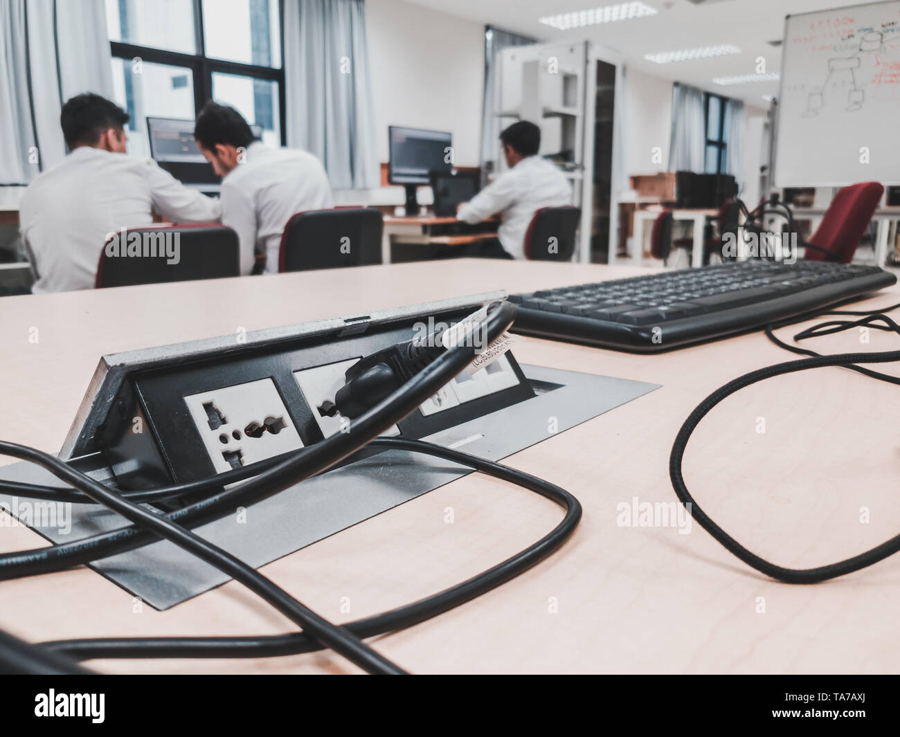 Close up of pop up electrical socket and ethernet cable socket (RJ45 ...