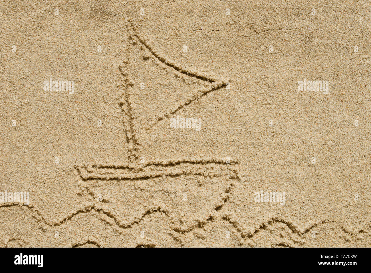 yacht on sea drawing in sand background top view Stock Photo - Alamy