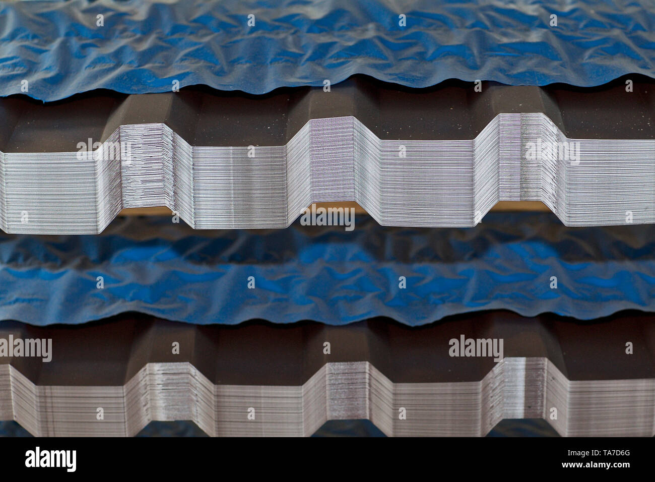 Profiled galvanized sheet with polymer coating in packs in the ...