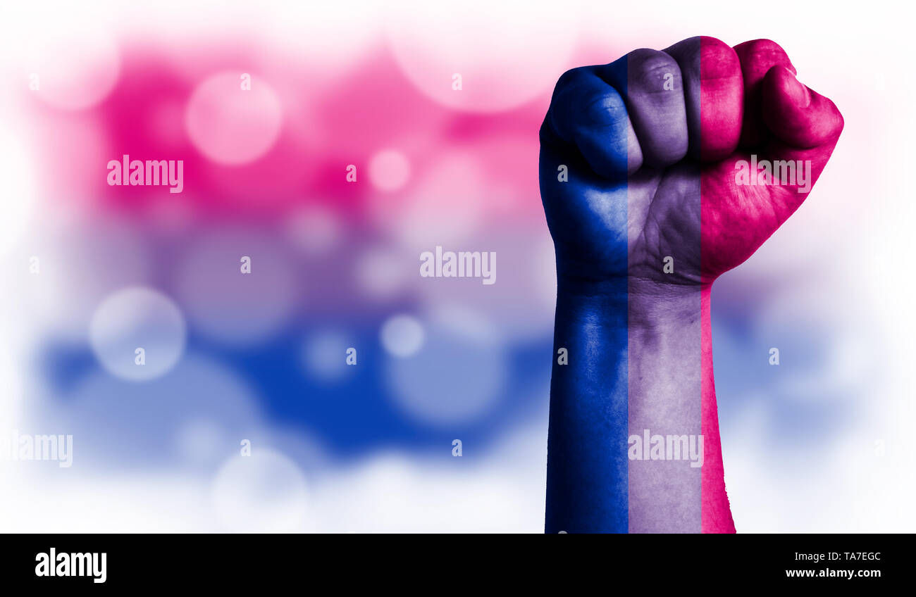 Flag of bisexual painted on male fist, strength,power,concept of ...