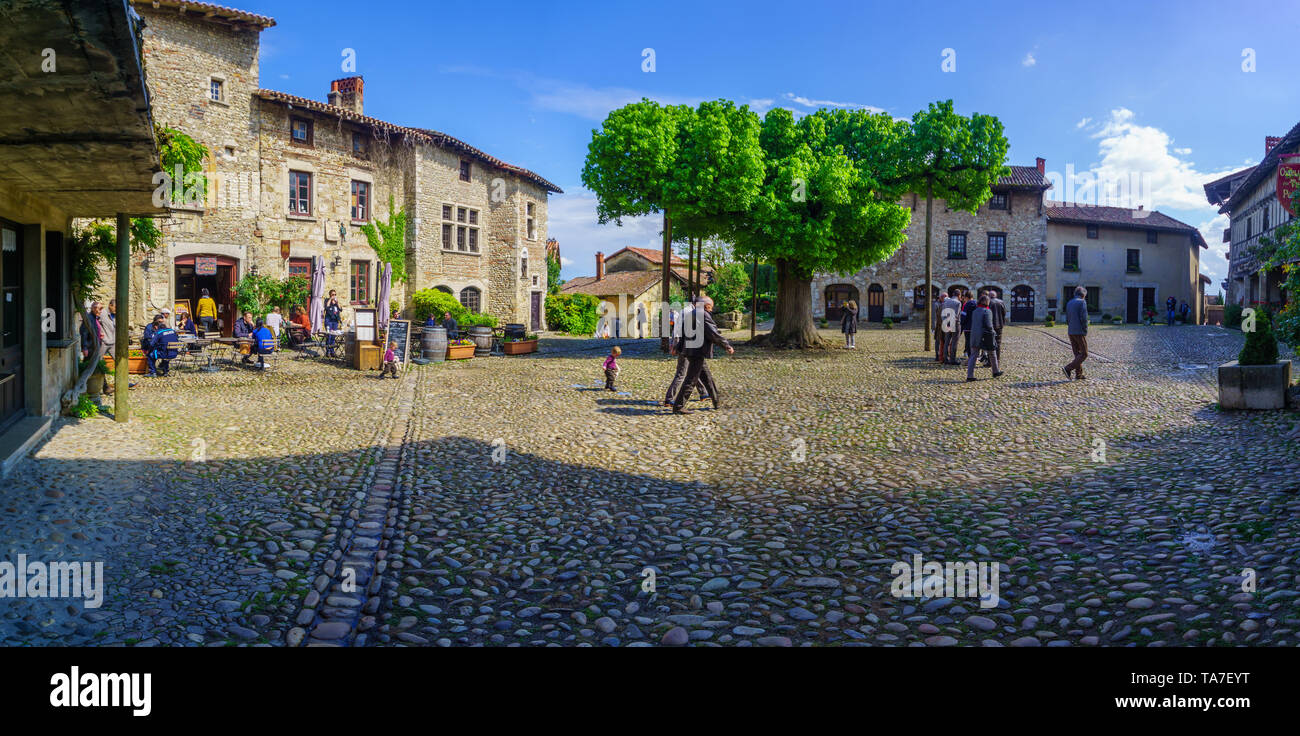 Perouges, France - May 04, 2019: Scene of the main square, with locals ...