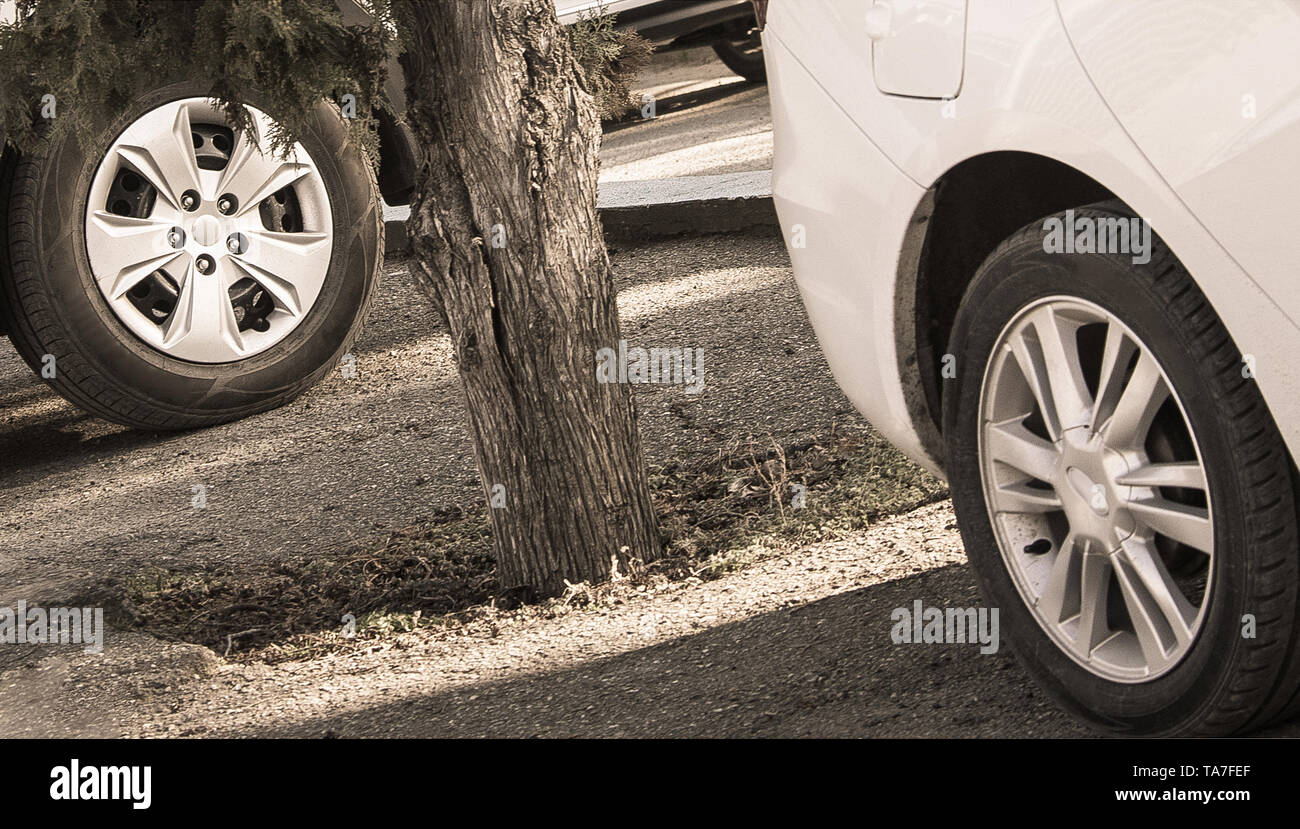 Parked cars in street hi-res stock photography and images - Alamy