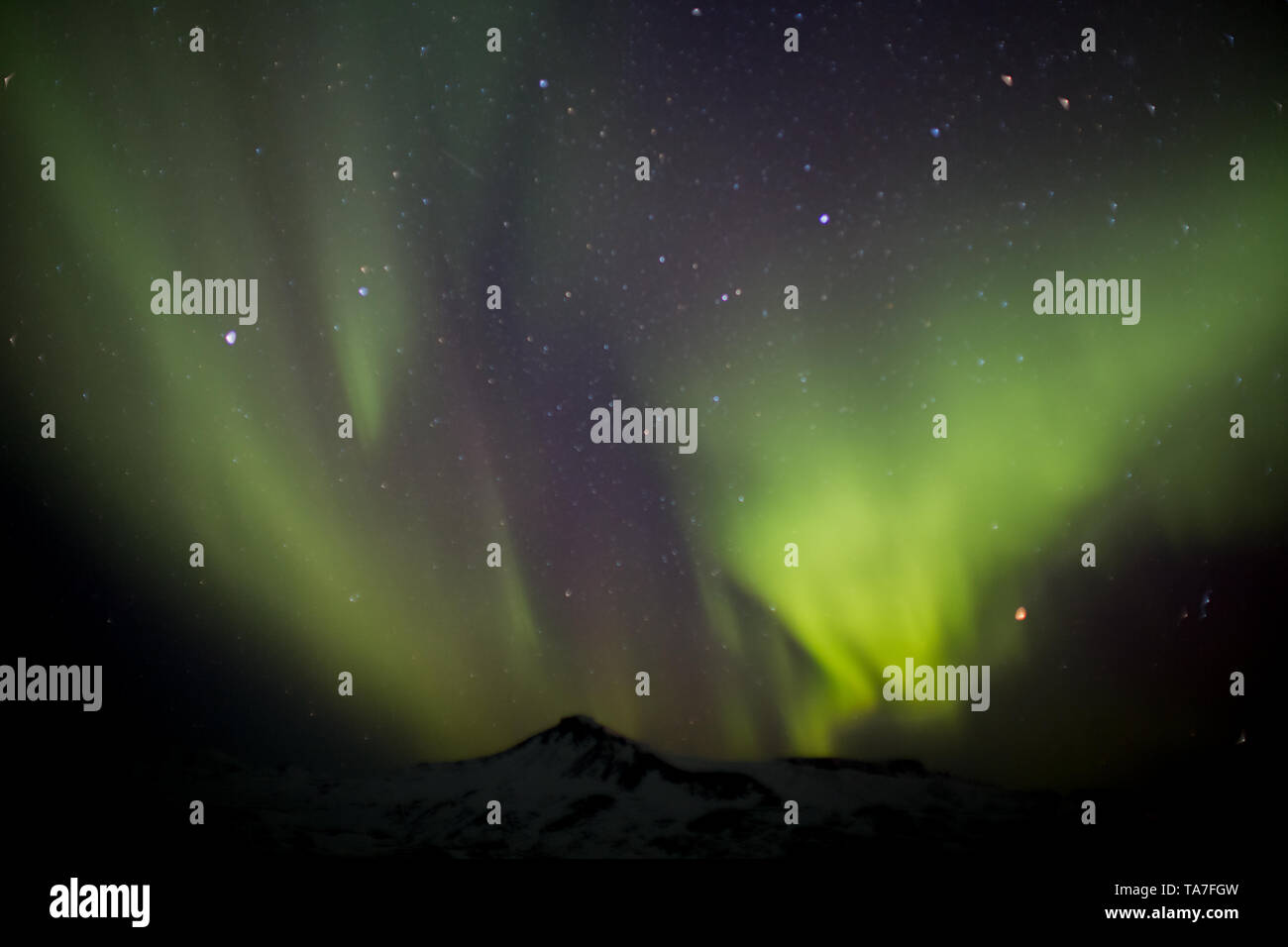 Aurora borealis green loop snow hi-res stock photography and images - Alamy