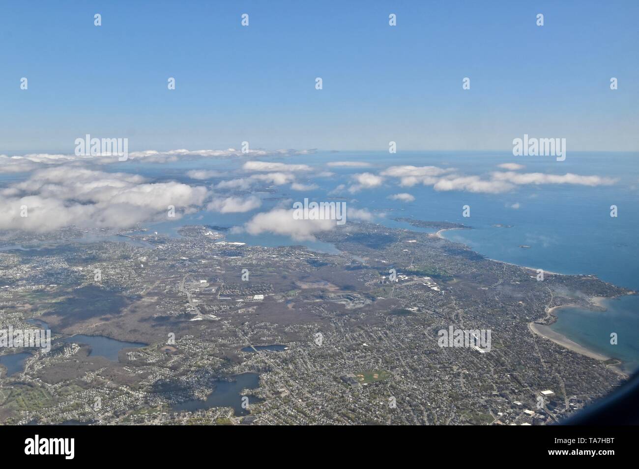 The Boston, Massachusetts skyline as seen from a plane landing at Logan ...