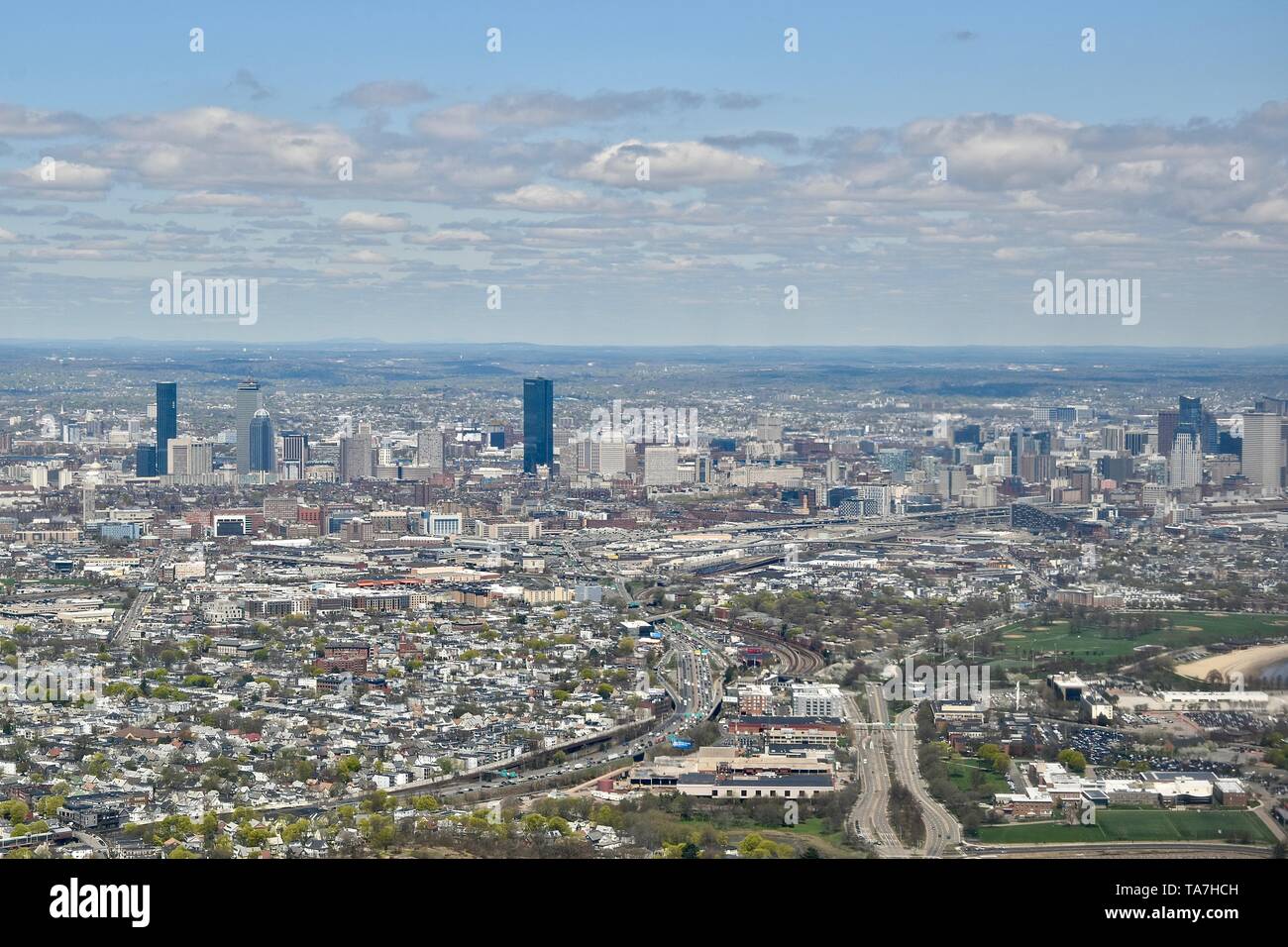 The Boston, Massachusetts skyline as seen from a plane landing at Logan ...