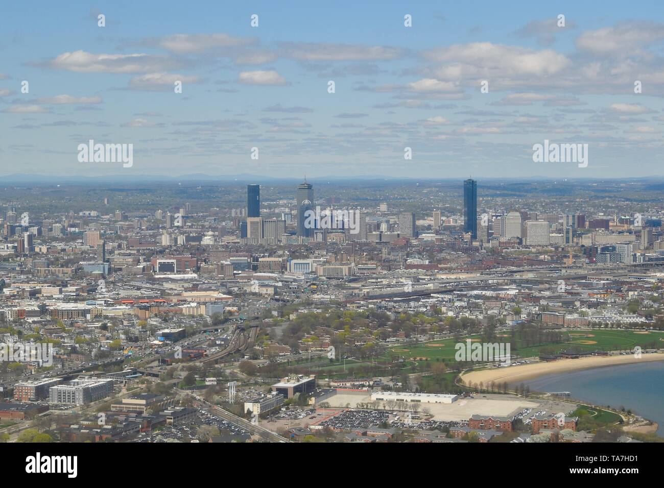 The Boston, Massachusetts skyline as seen from a plane landing at Logan ...