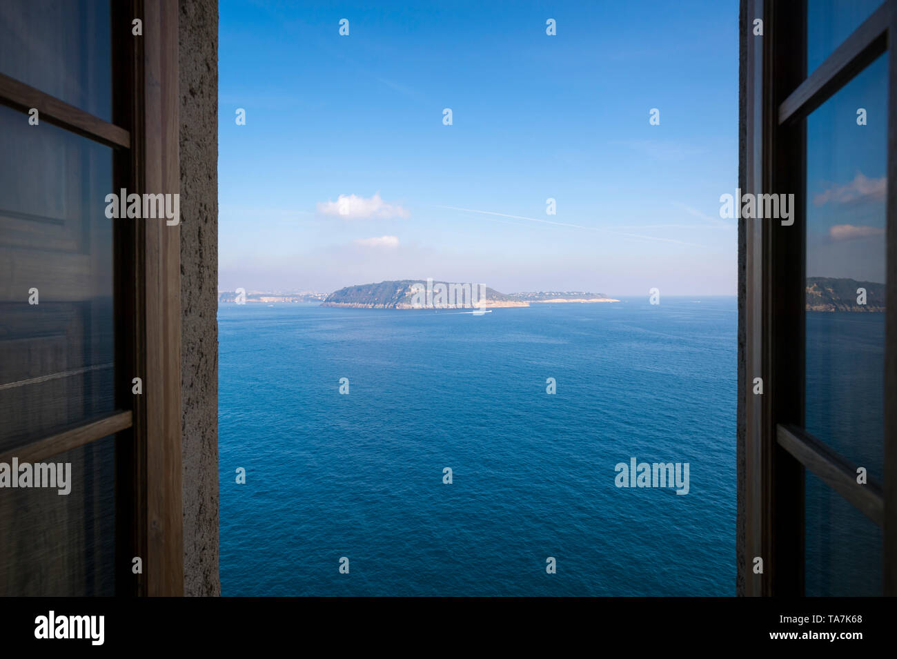 Bright scenic Mediterranean Sea view of the Amalfi Coast framed by old ...