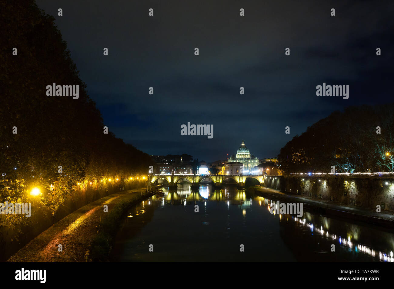 Night scene of Rome, Tevere river with Saint Peter basilica in ...