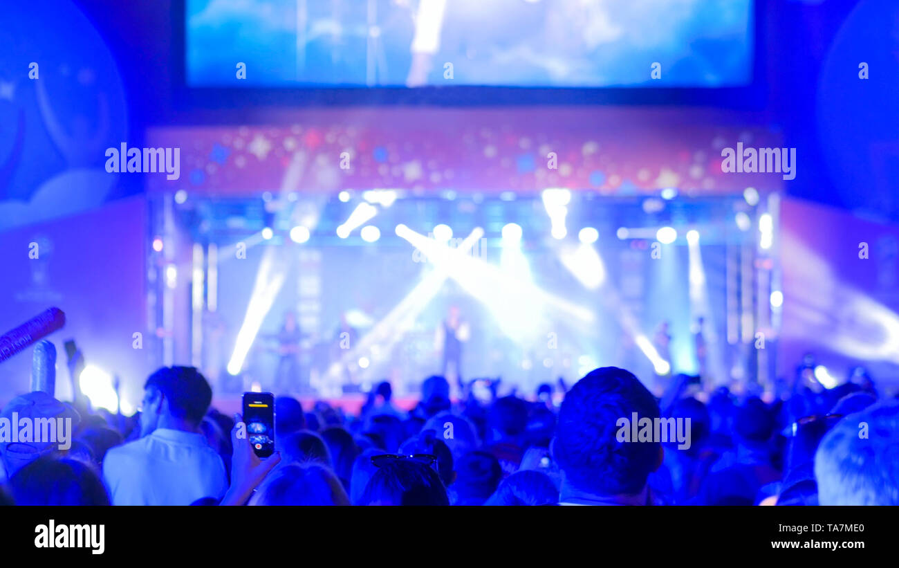 People partying at night open air concert Stock Photo - Alamy
