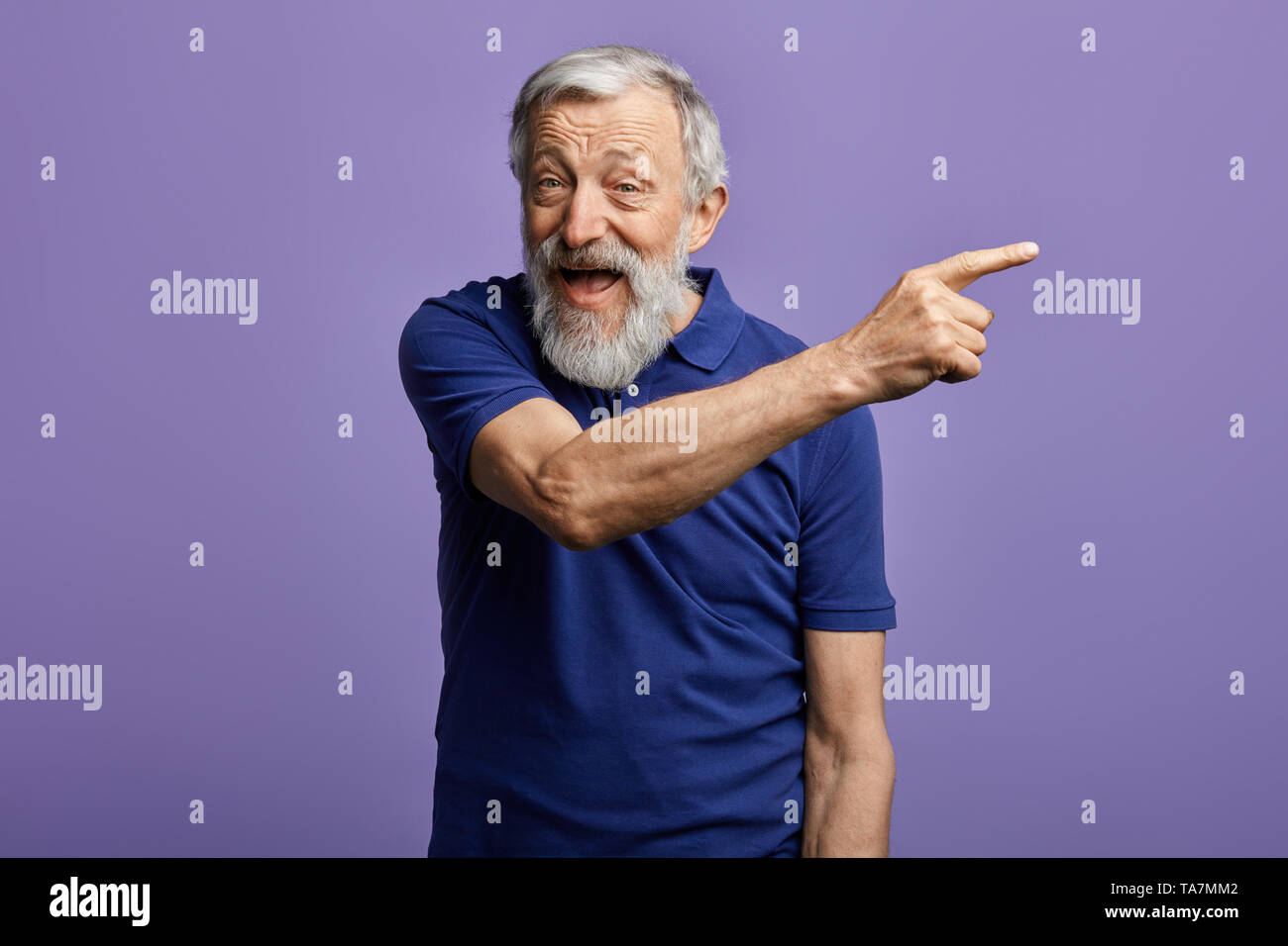 Old man pointing mouth hi-res stock photography and images - Alamy