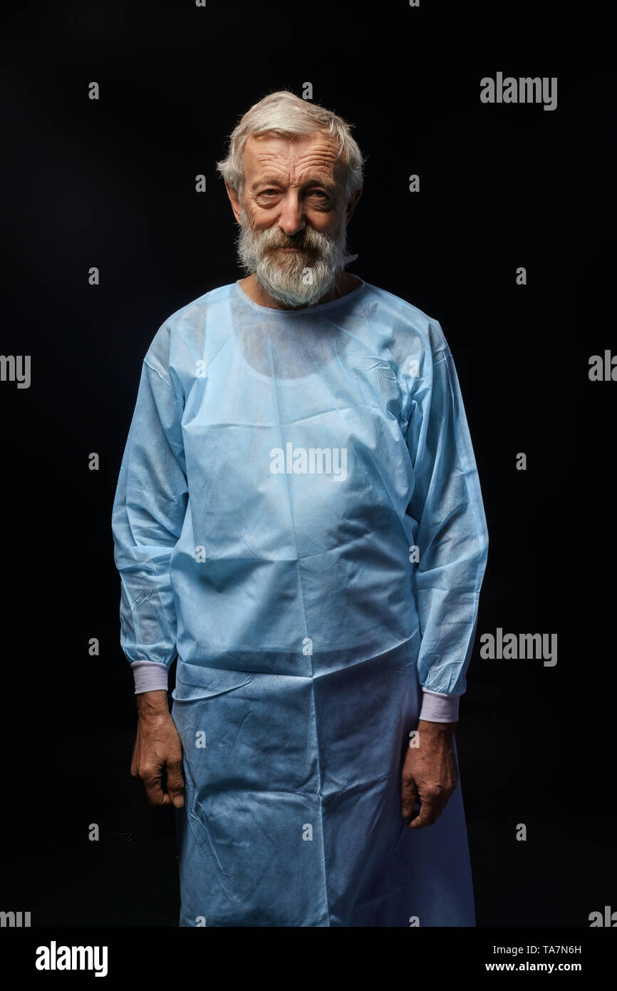 Handsome elderly doctor in uniform hi-res stock photography and images ...