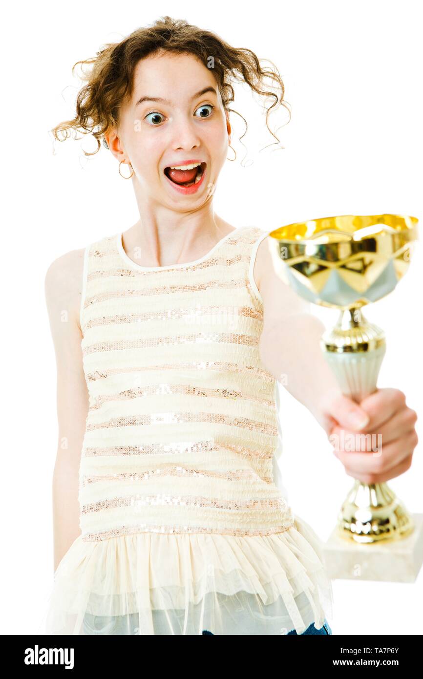 Girl winning cup hi-res stock photography and images - Alamy