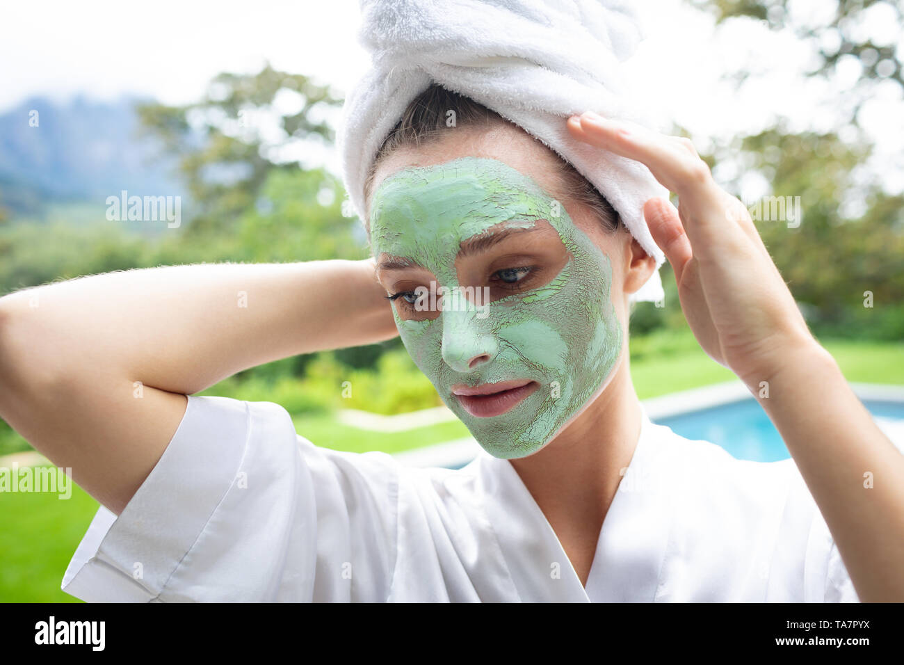 Beautiful woman in mask standing hi-res stock photography and images ...